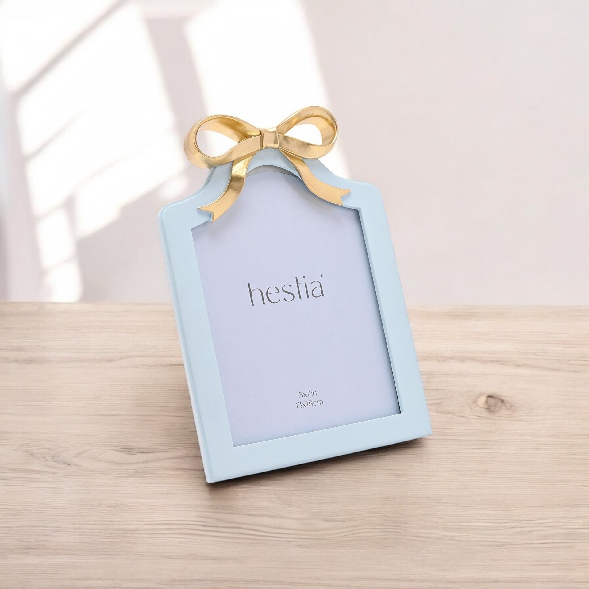 Hestia Soft Blue Photo Frame With a Gold Bow - 5" x 7"